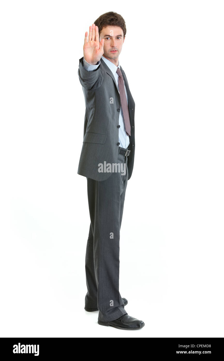 Full length portrait of businessman showing stop gesture Stock Photo ...