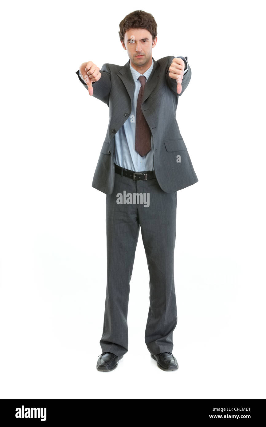 Full length portrait of businessman showing thumbs down Stock Photo - Alamy