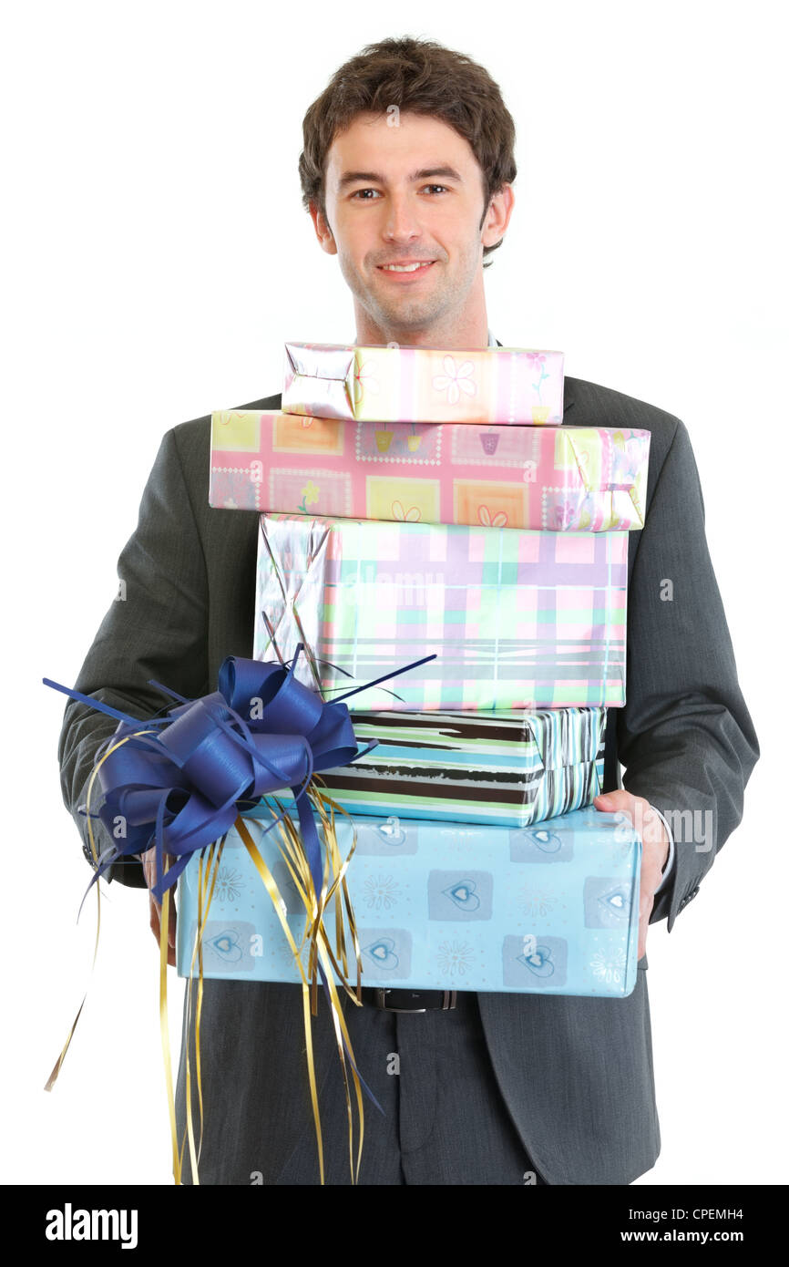 Man holding stack of gift boxes Stock Photo - Alamy