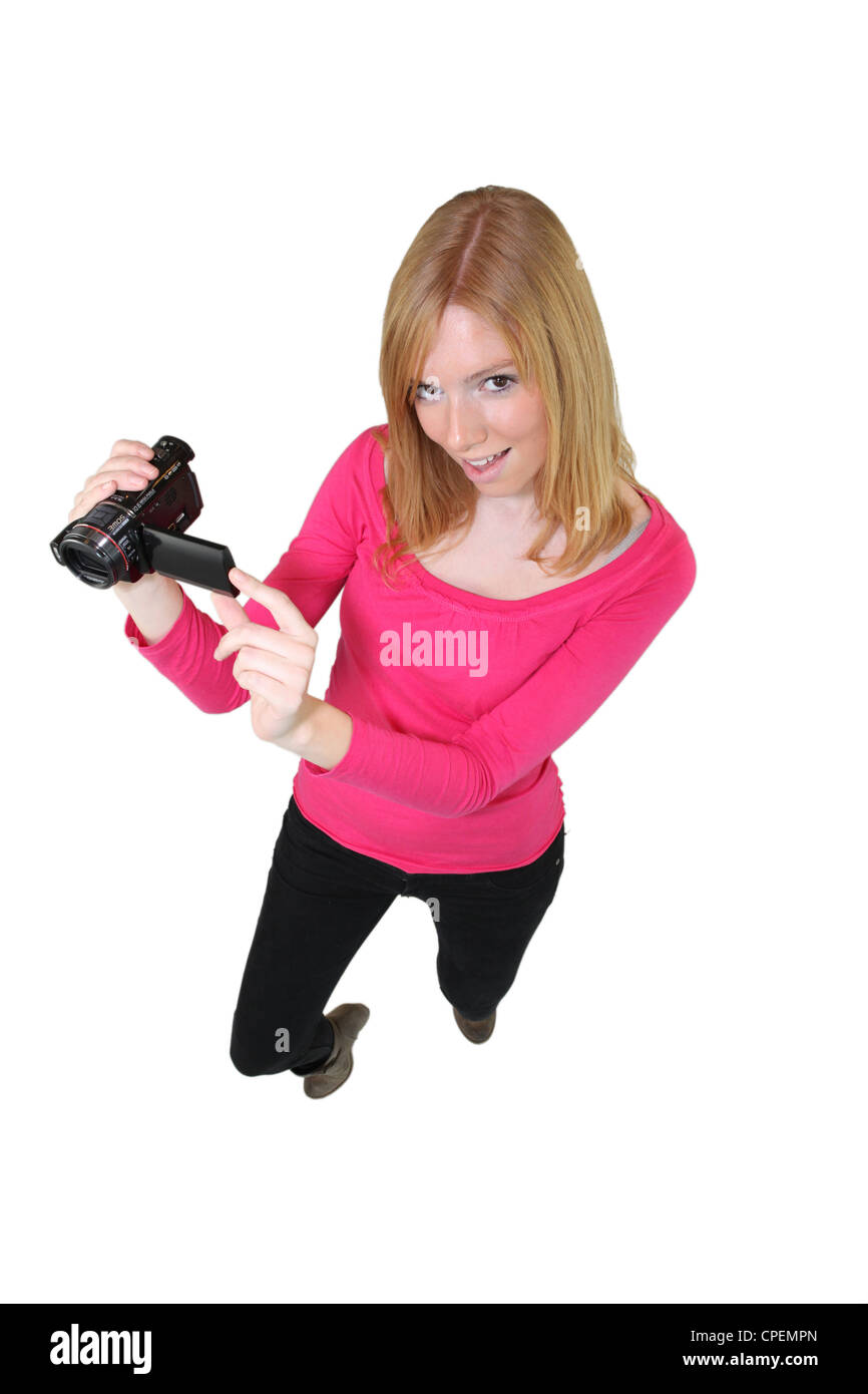 Girl using camcorder Stock Photo - Alamy