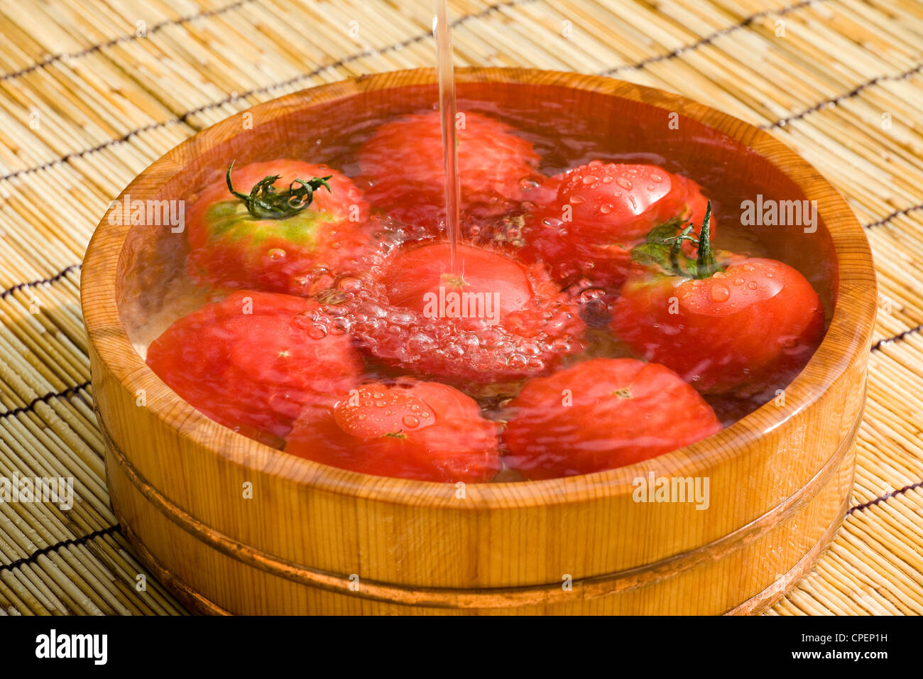 Washing tomato in running water hi-res stock photography and images - Alamy