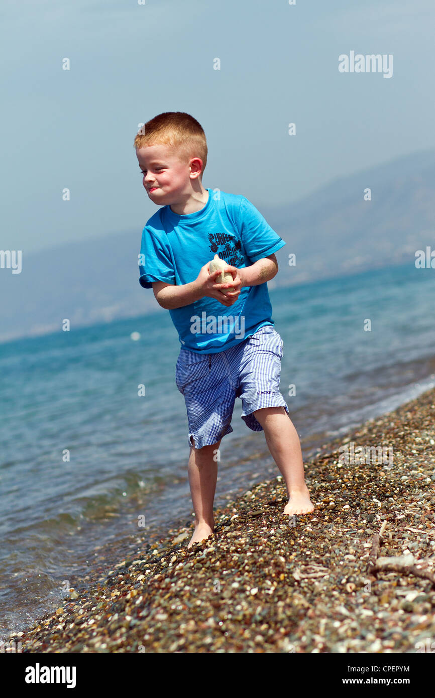 little boy having fun on summer holiday Stock Photo - Alamy