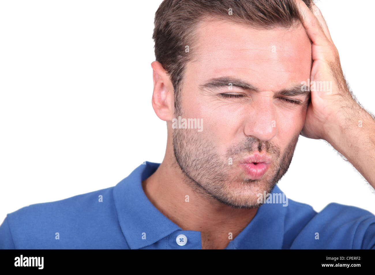 Man with headache Stock Photo - Alamy
