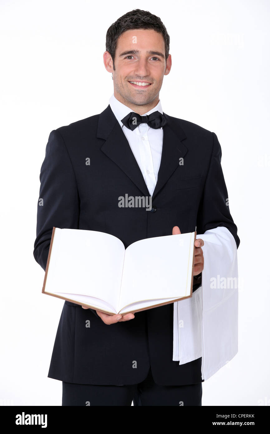 A waiter of a fancy restaurant Stock Photo - Alamy