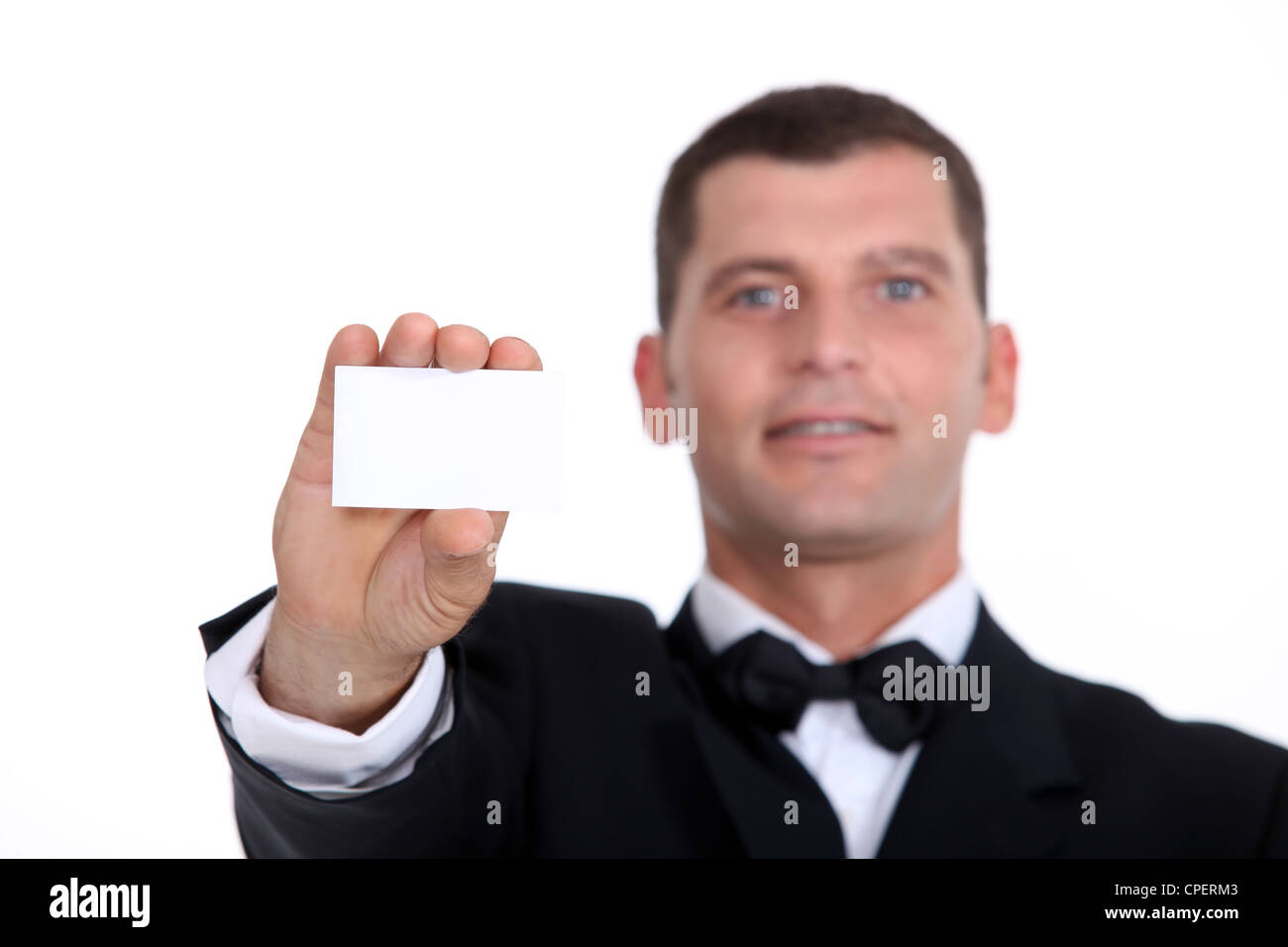 Gentleman showing businesscard Stock Photo - Alamy