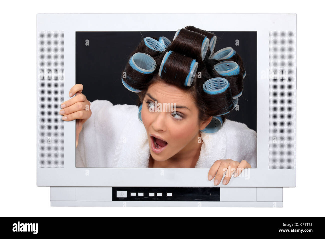 Woman escaping from television set Stock Photo - Alamy