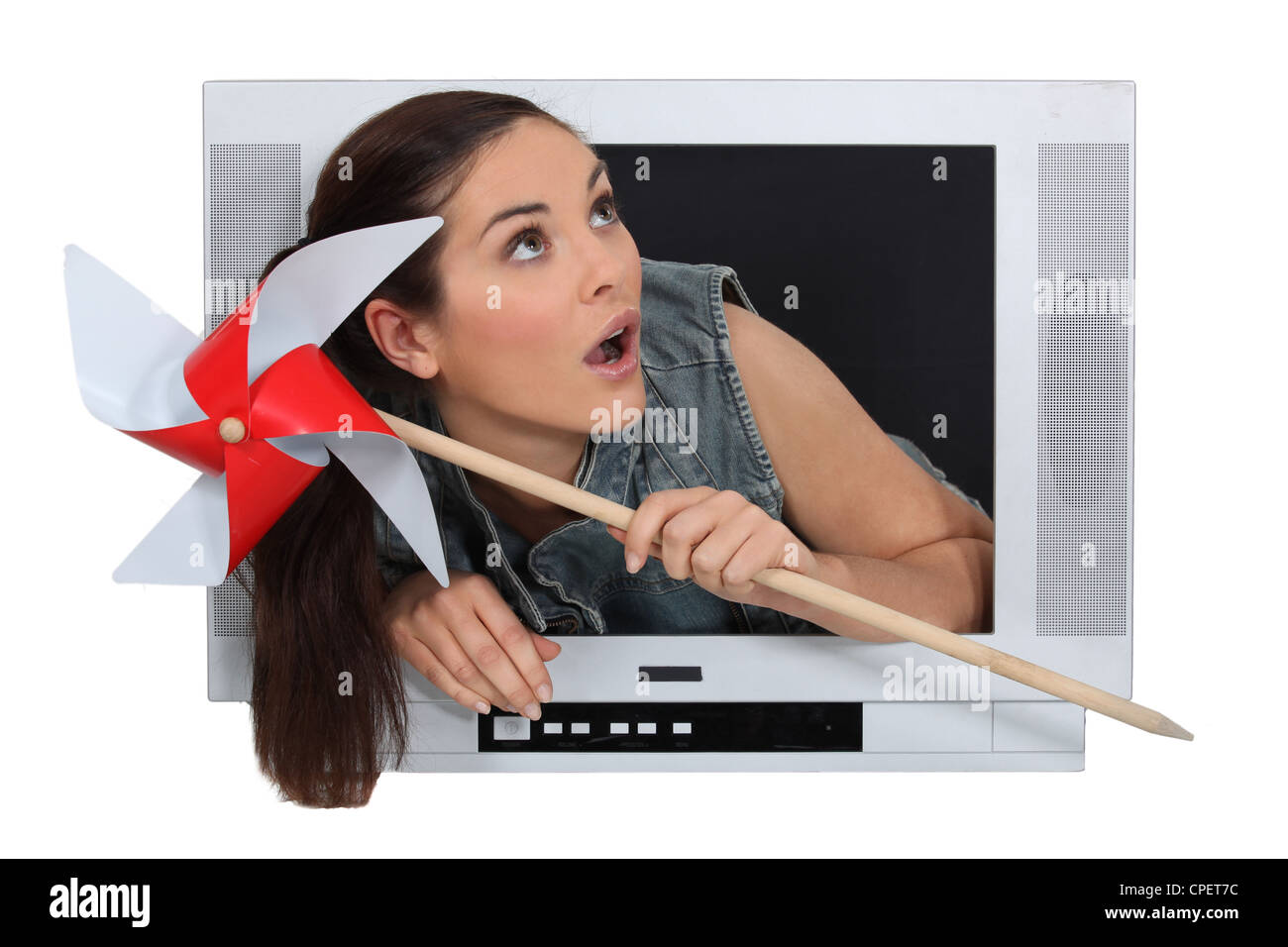 Woman crossing TV screen Stock Photo - Alamy