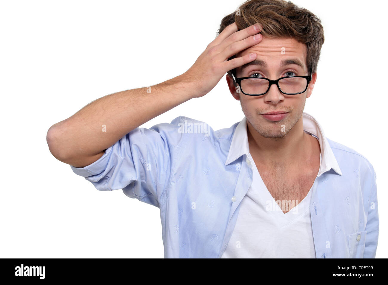 young man looking confused Stock Photo - Alamy