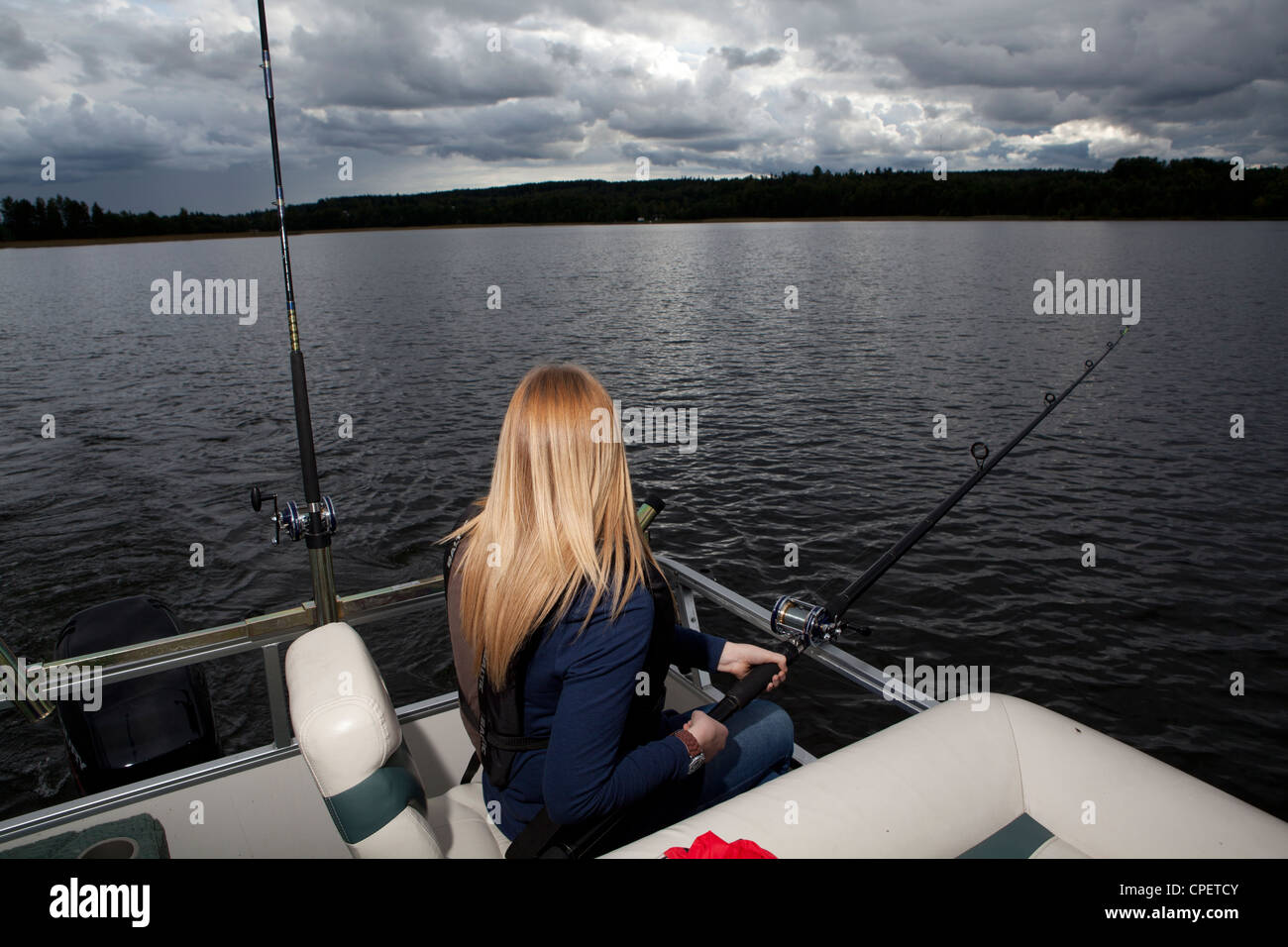 Fishing in lake Finland Stock Photo - Alamy