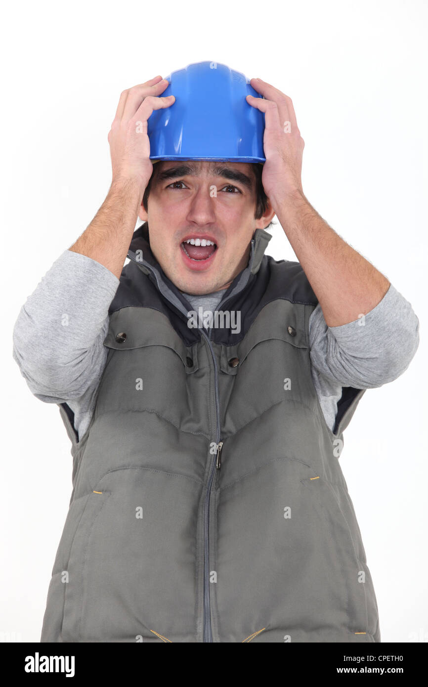 Confused puzzled construction builder worker hi-res stock photography ...