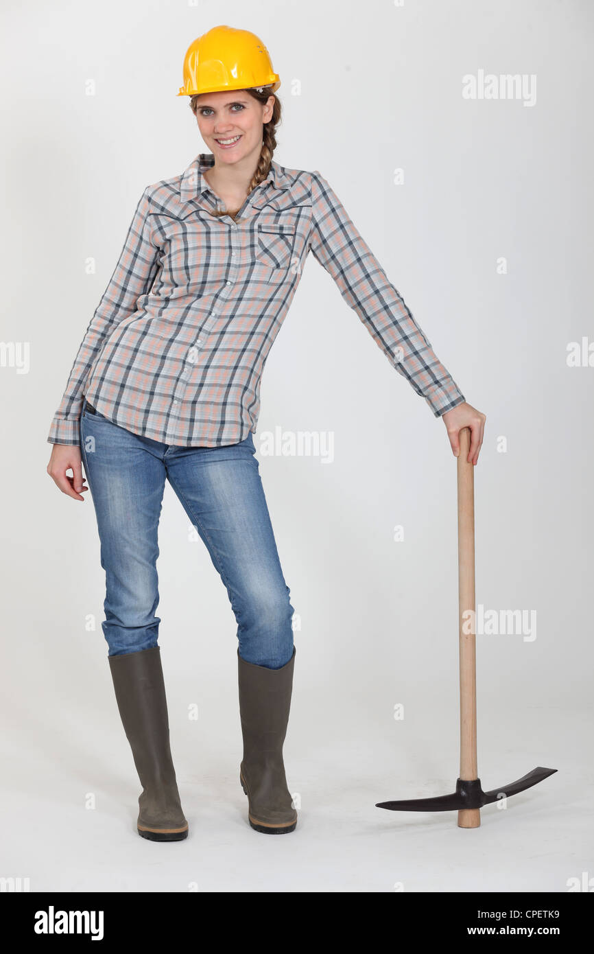 Woman with a pickaxe Stock Photo - Alamy