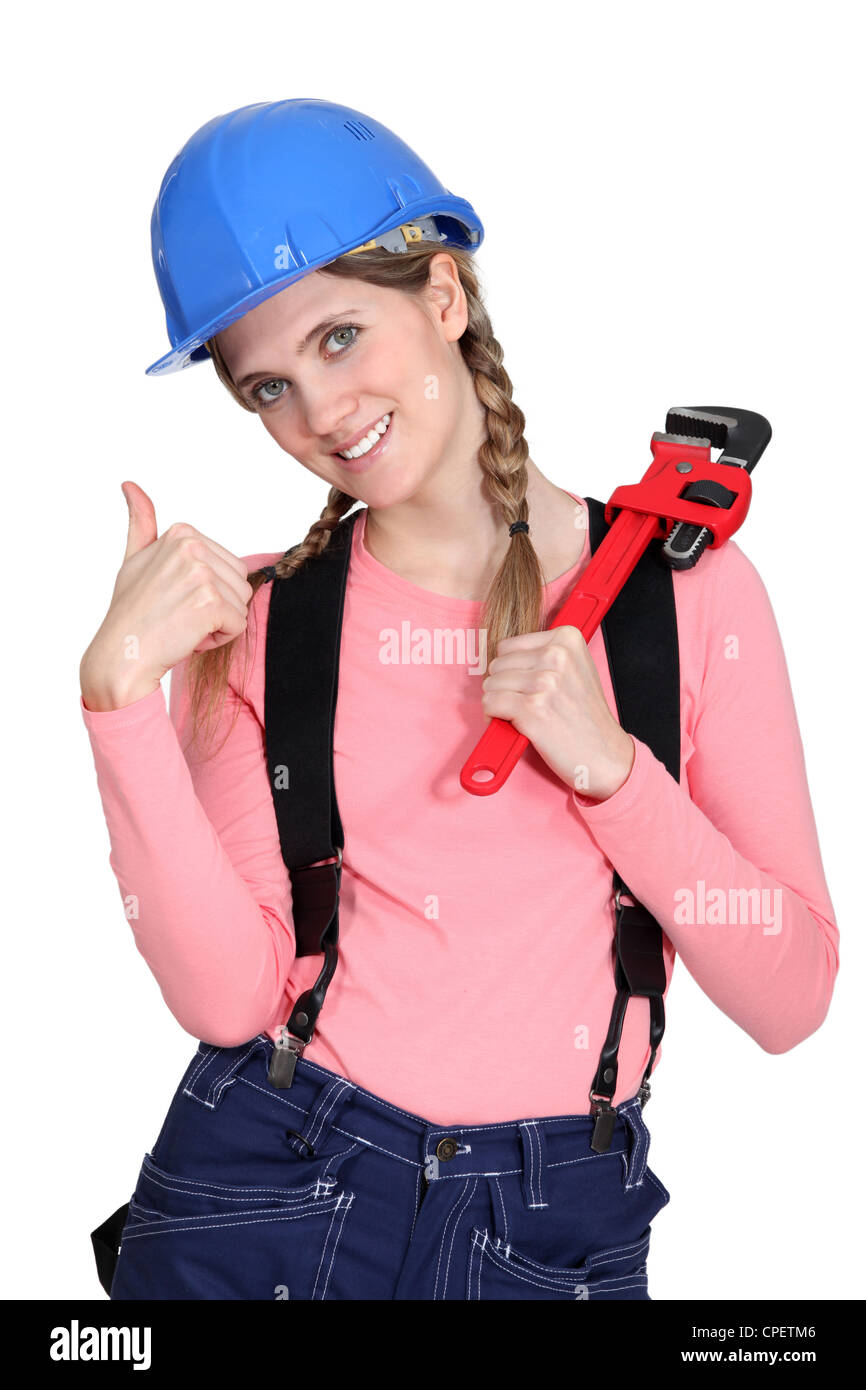 A female construction worker with a wrench Stock Photo - Alamy