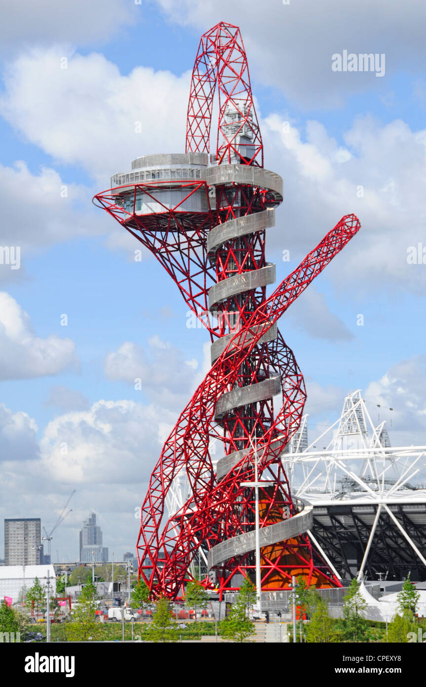 Part of stadium & ArcelorMittal Orbit tower in the 2012 London Olympic park with City of London ...