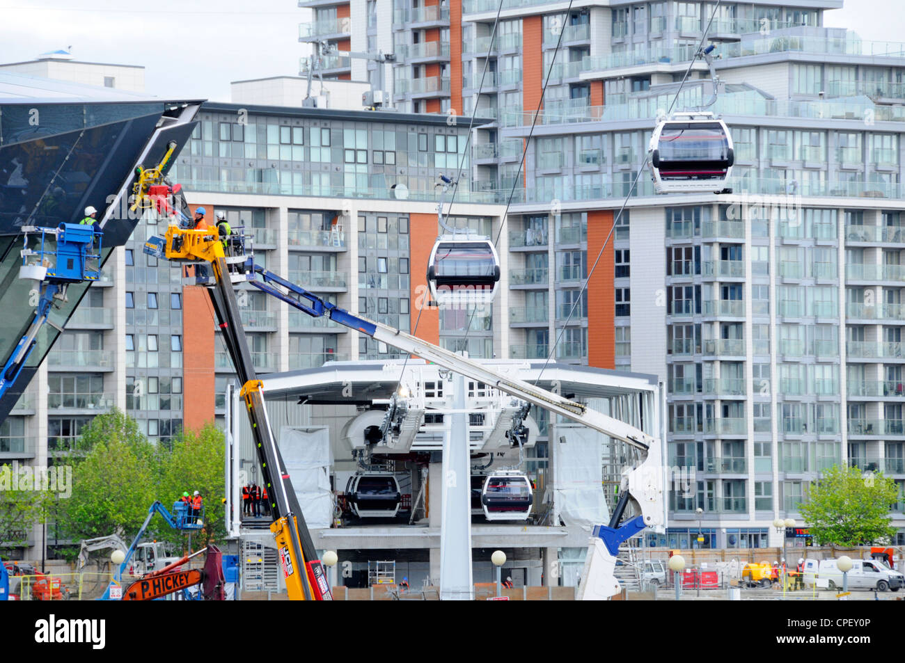 Cable car gondolas pass construction building site for Siemens new ...