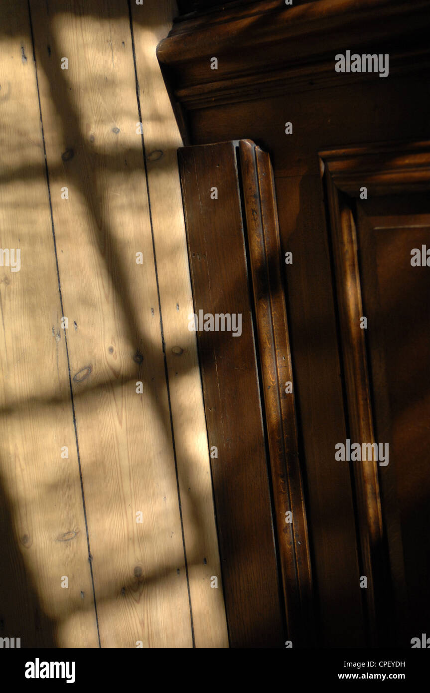 Light from a window reflecting on wall, UK Stock Photo - Alamy
