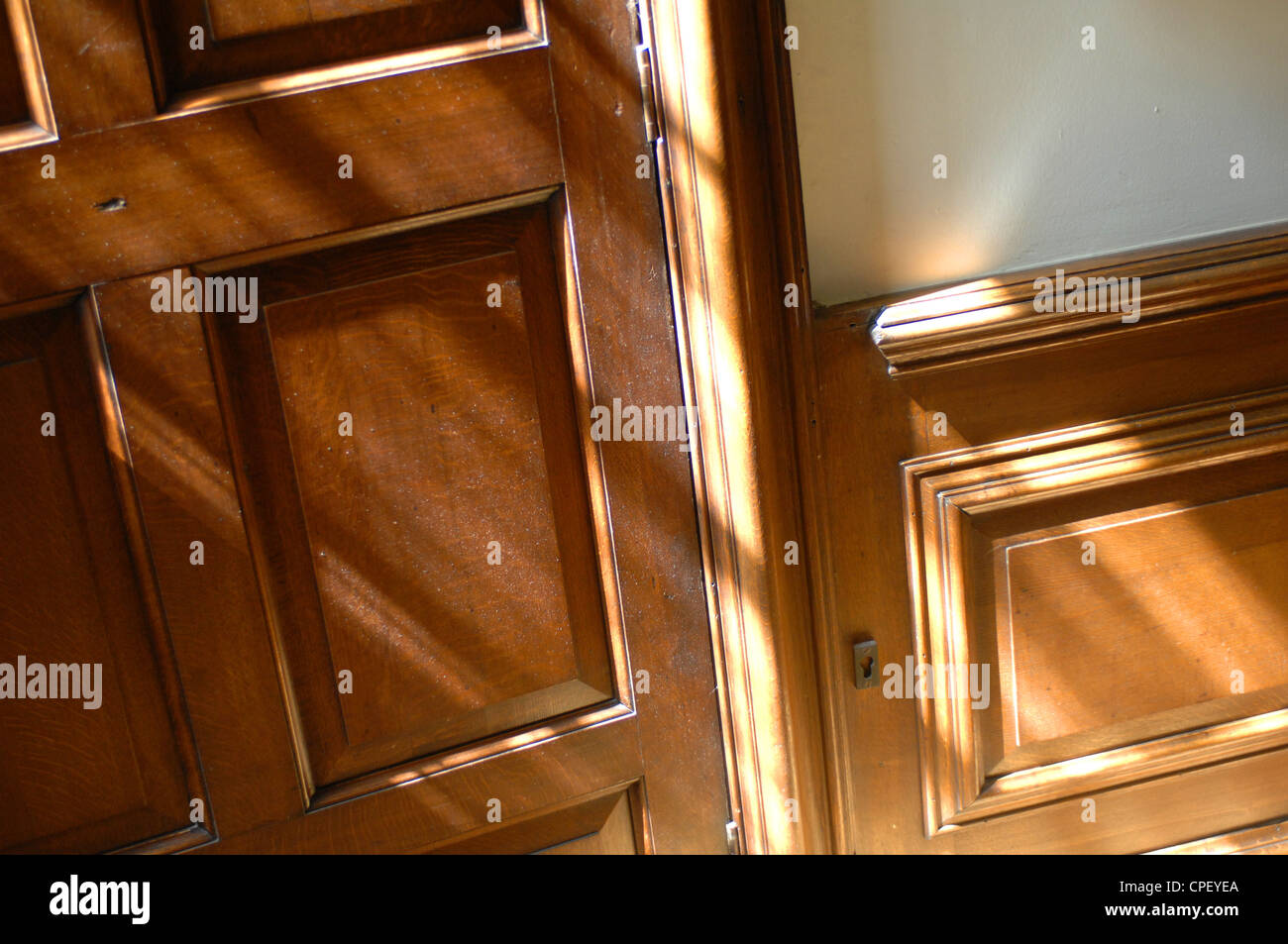 Light from a window reflecting on wall, UK Stock Photo - Alamy