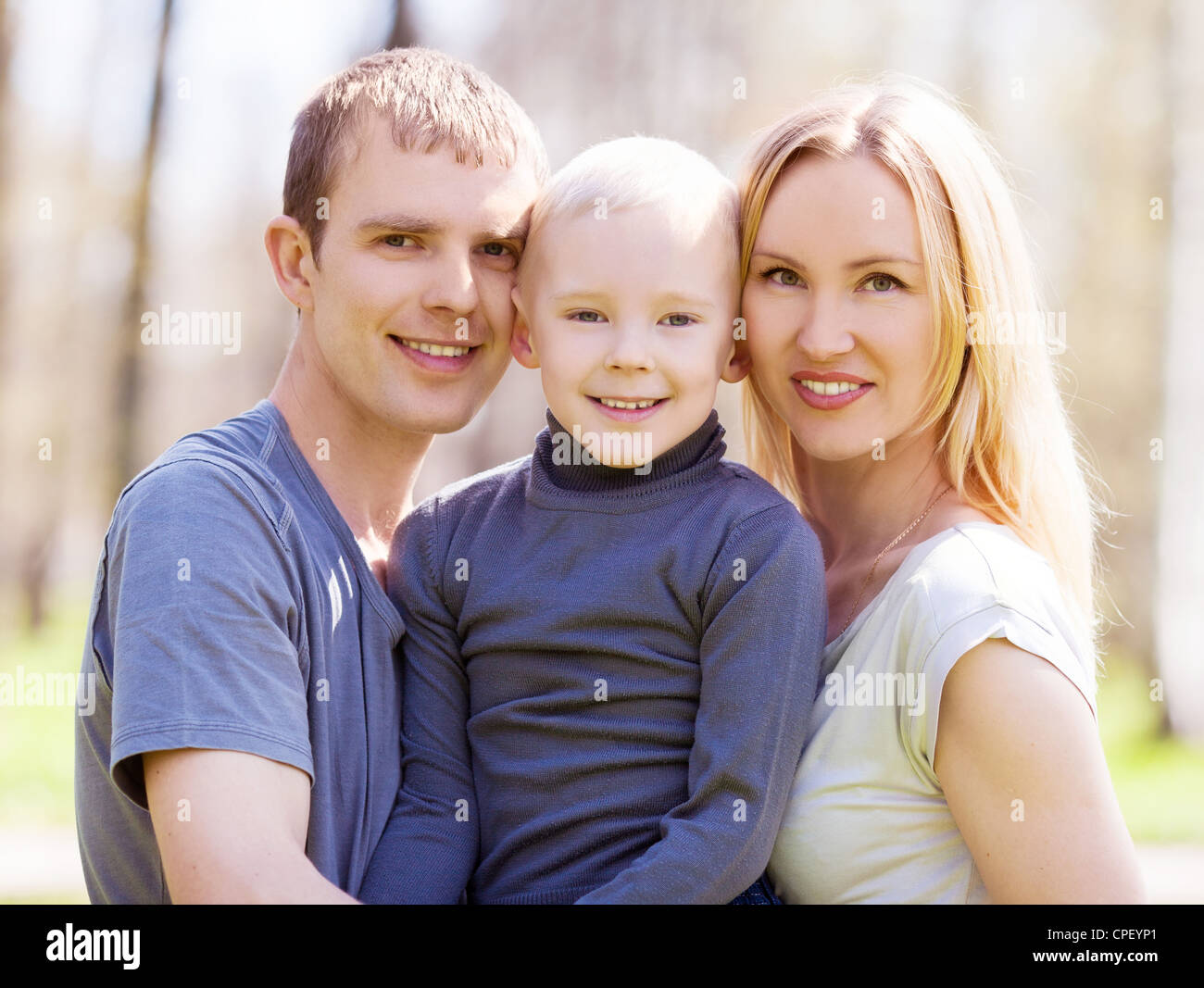 happy family outdoor in the park Stock Photo - Alamy