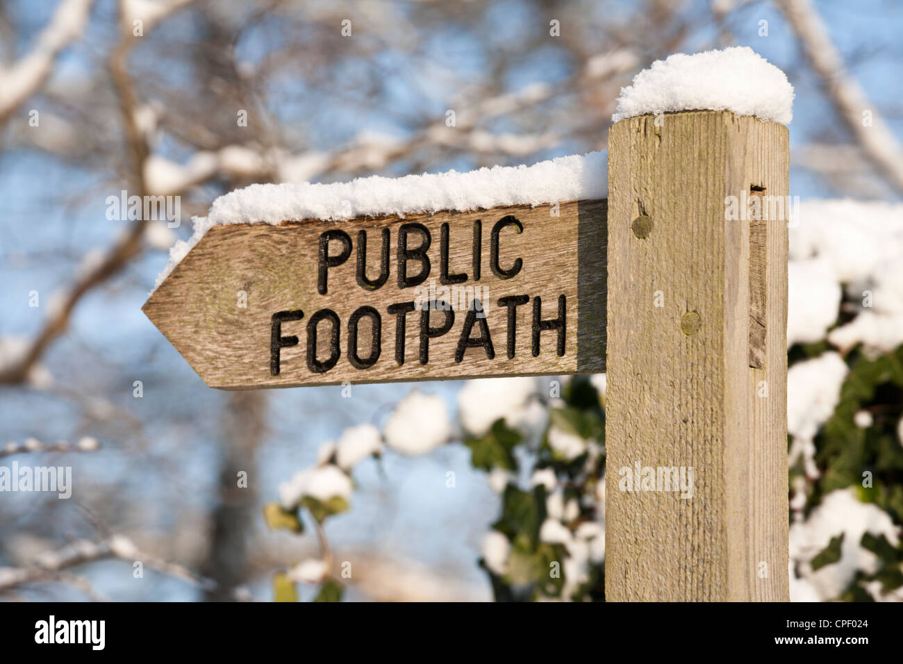 A public footpath signpost with snow Stock Photo - Alamy