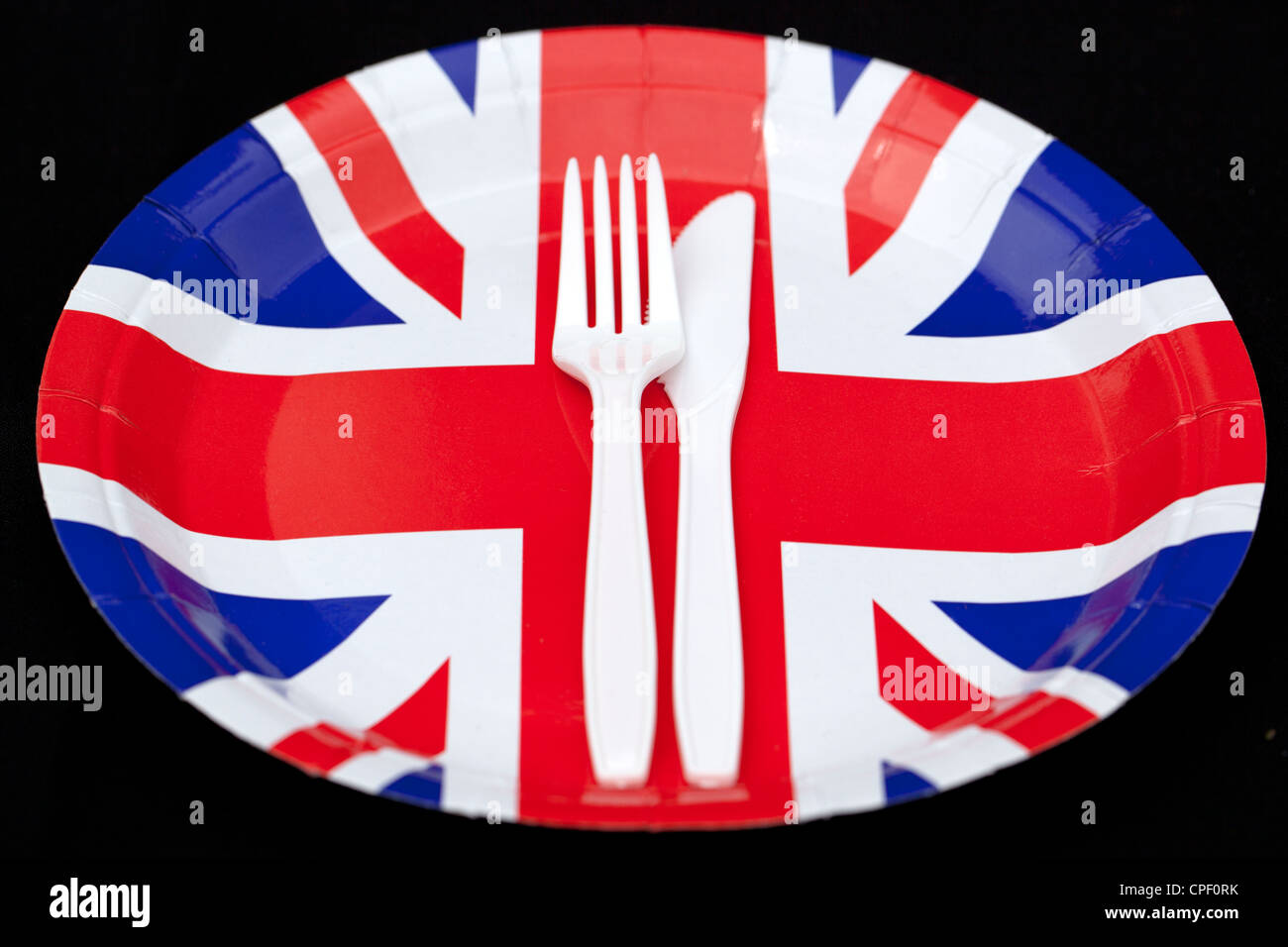 Union Jack Plate with Plastic Cutlery on black background Stock Photo ...