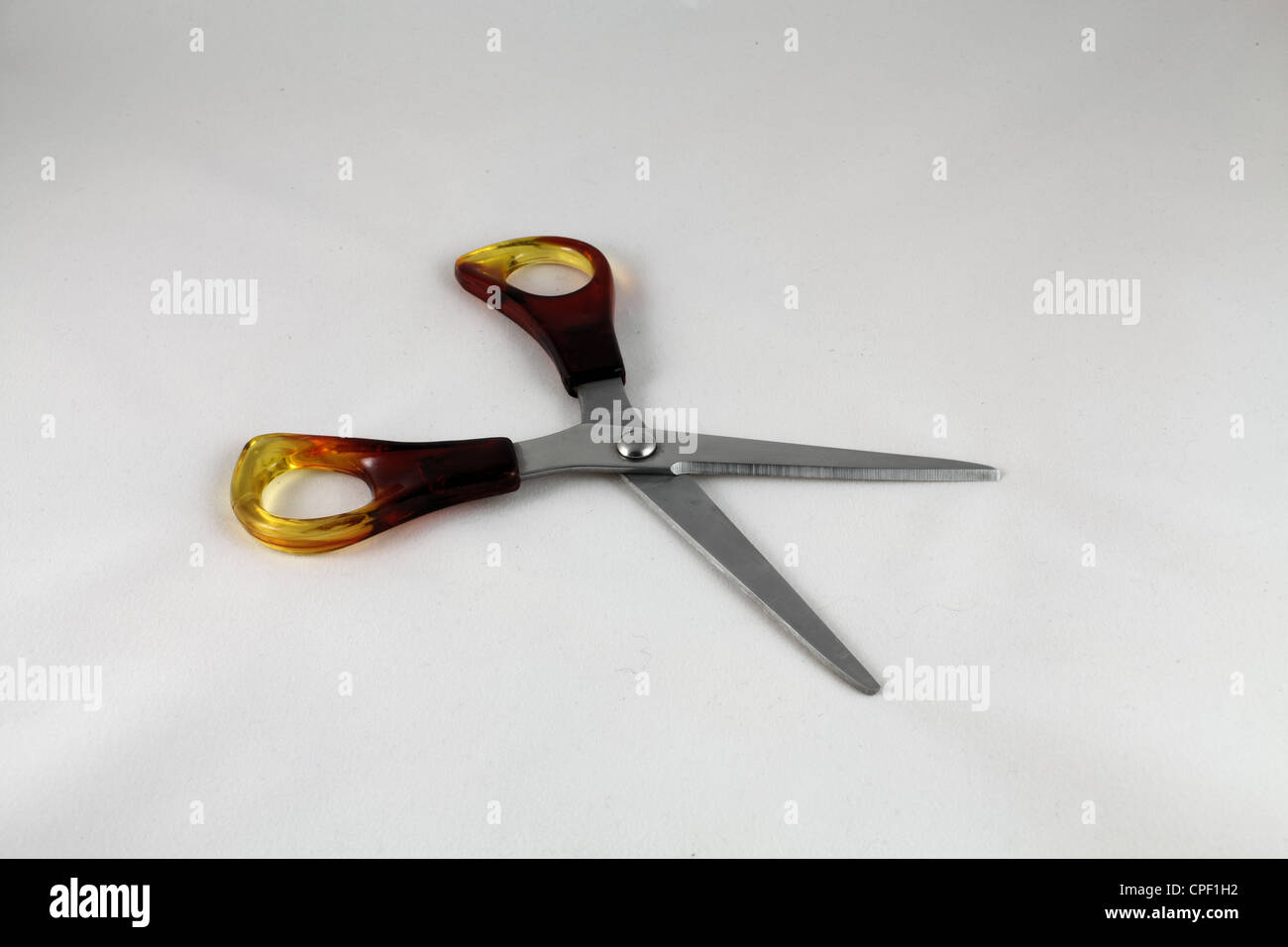 Pair of open scissors in a light tent with white background Stock Photo ...
