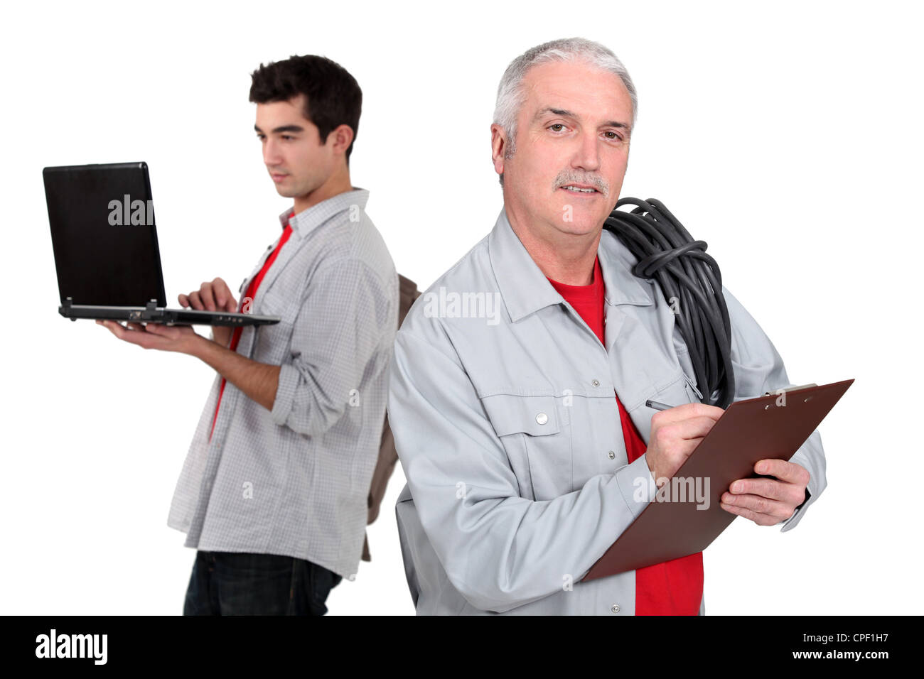 Father and son working together Stock Photo - Alamy