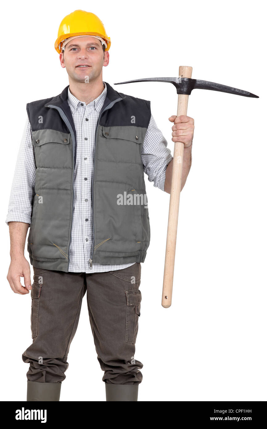Man holding pick-Axe in one hand Stock Photo - Alamy