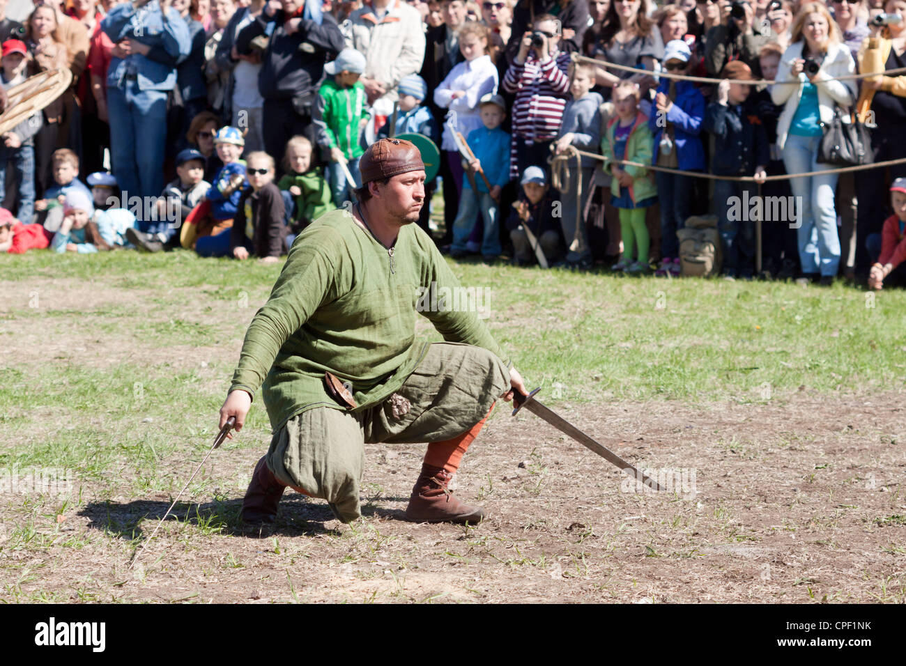 Warrior with two swords Stock Photo - Alamy