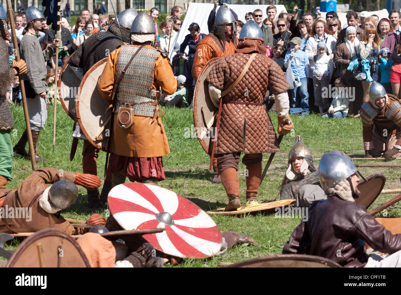 Group of warriors with shields Stock Photo - Alamy