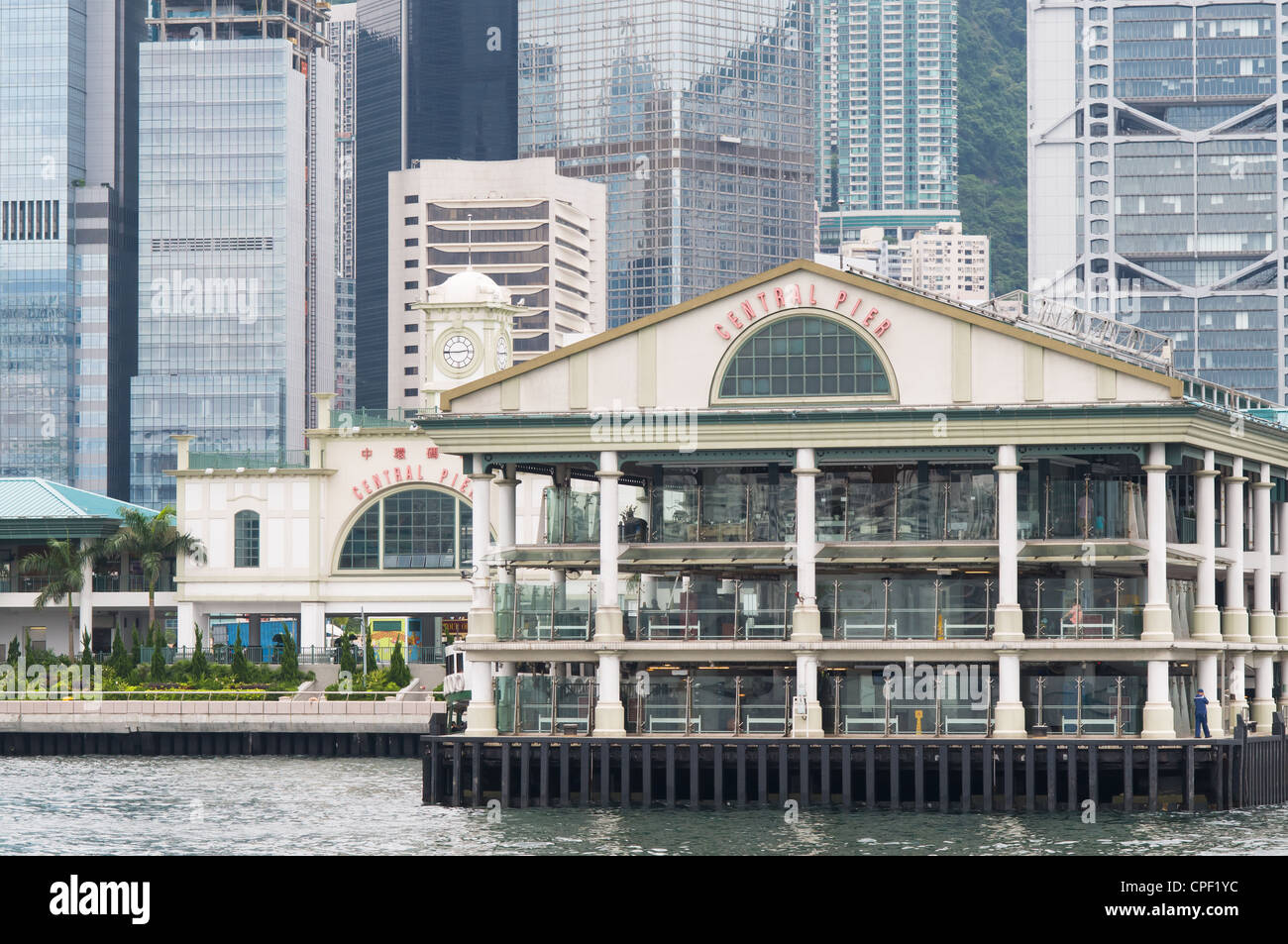 Central Pier in Hong Kong with skyscrapers in the background Stock ...