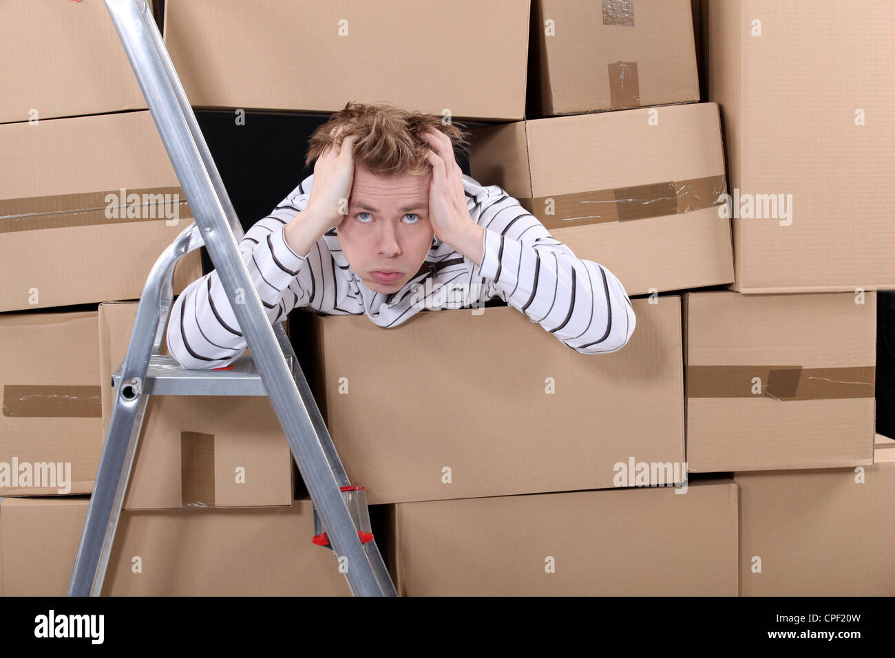 Stressed factory worker Stock Photo - Alamy