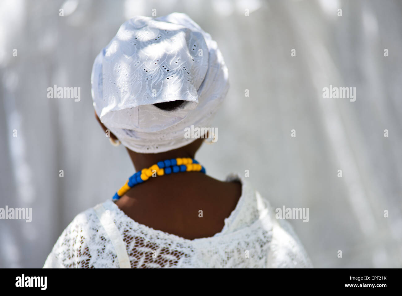 A young Baiana girl seen during the ritual ceremony in honor to Yemanjá ...