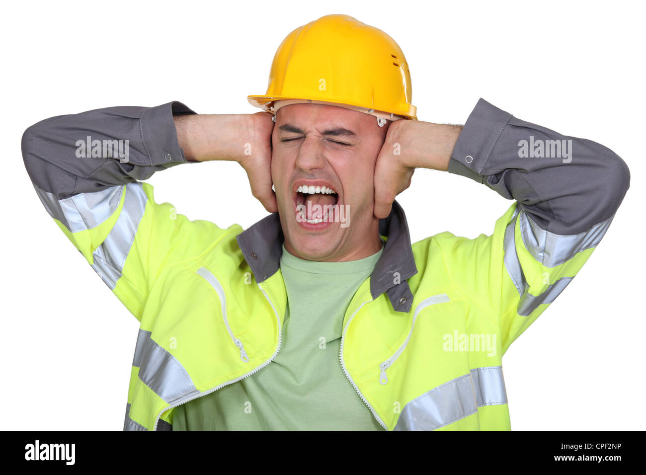 Workers covered their ears Stock Photo - Alamy