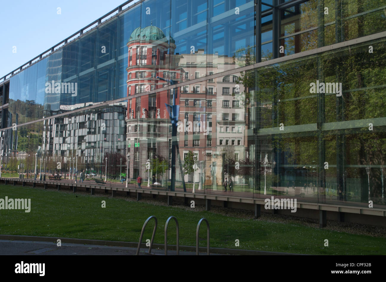 Buildings reflected in glazed elevation of opposite building Stock ...