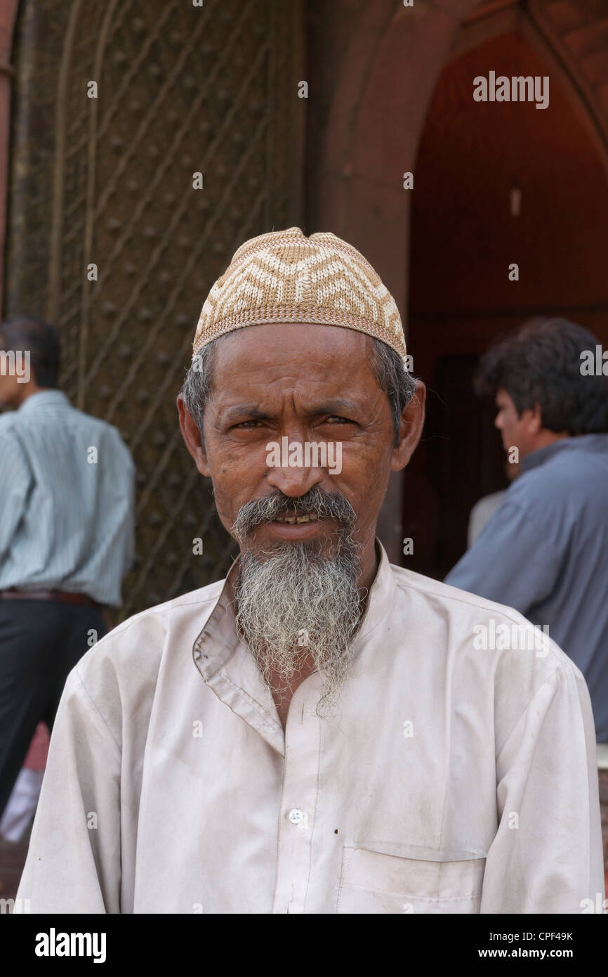 A Muslim man outside Jama Masjid Stock Photo - Alamy