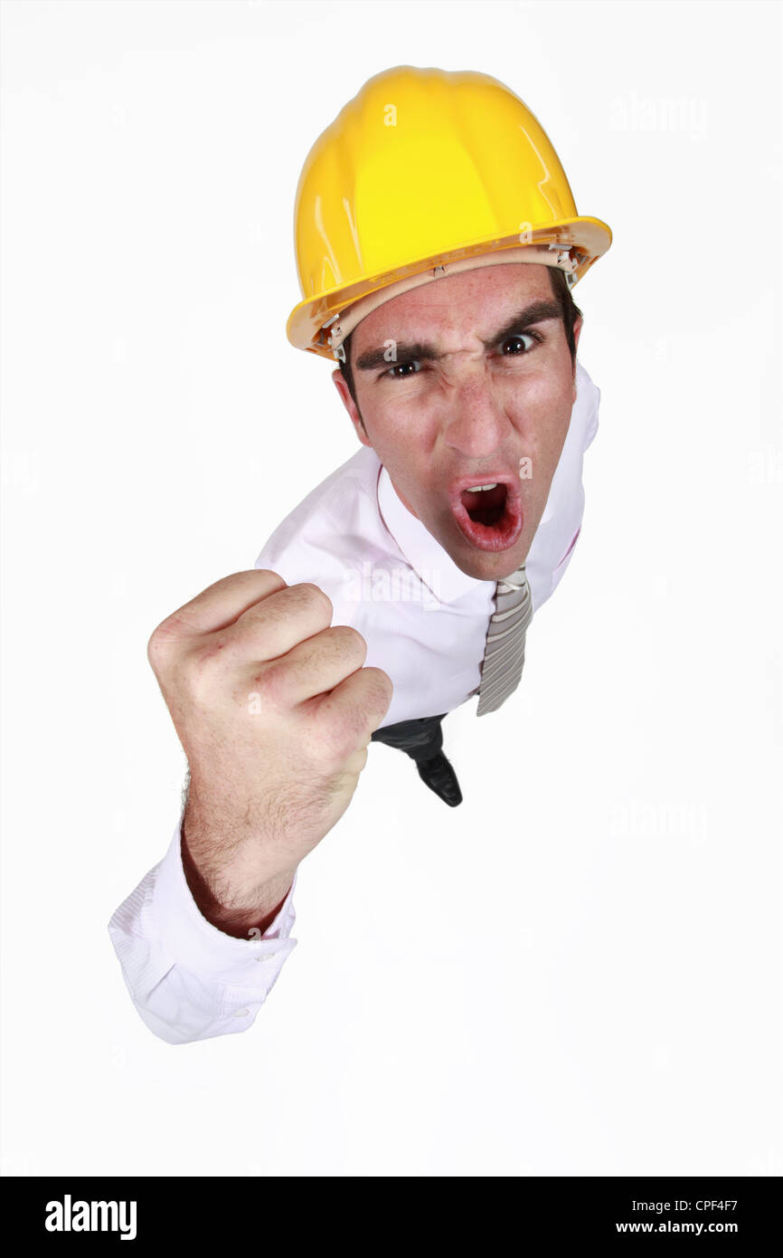 Excitable architect waving fist Stock Photo - Alamy