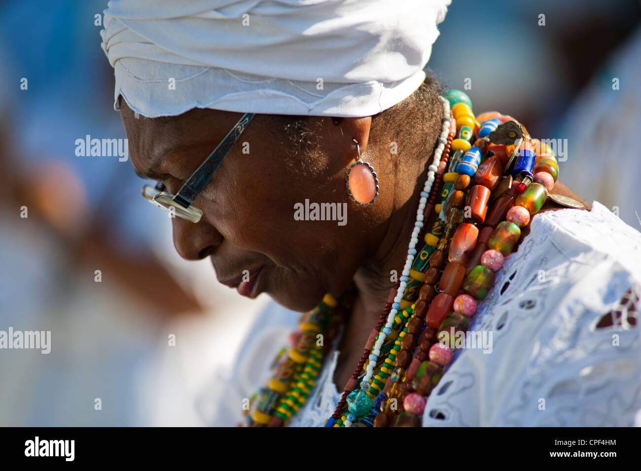 A priestess of Candomblé seen during the ritual procession in honor to ...