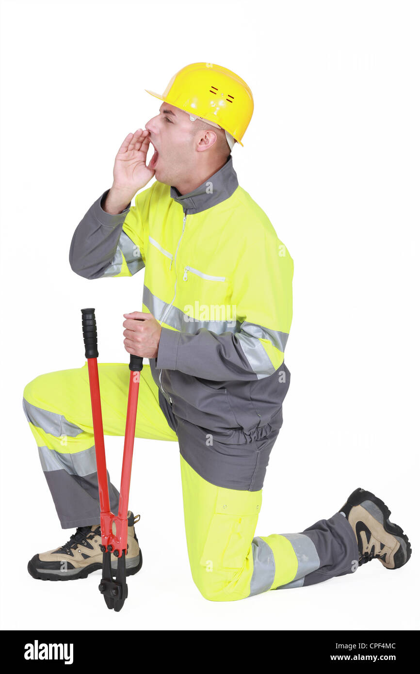 Construction worker shouting Stock Photo - Alamy