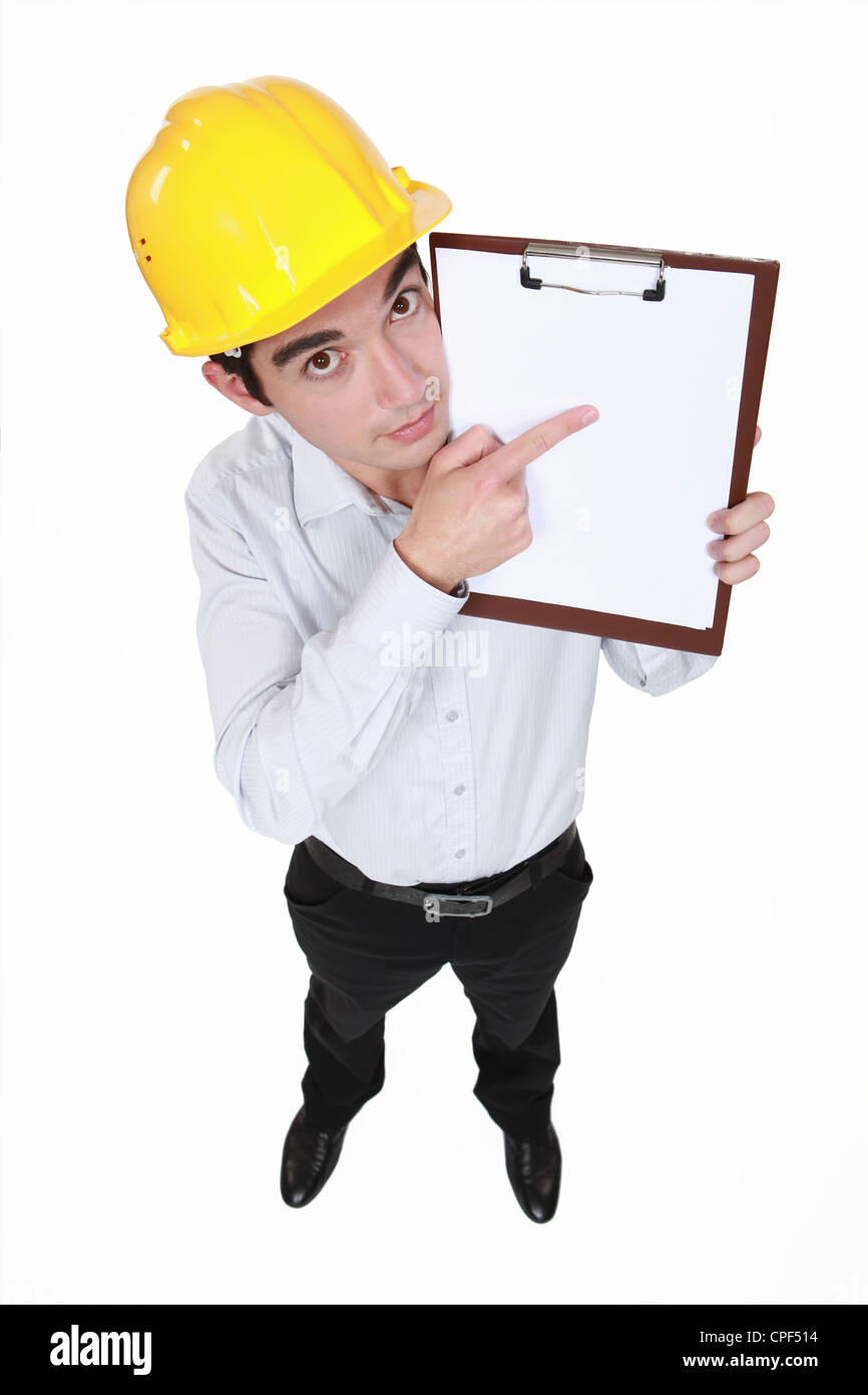 Man with helmet pointing portfolios Stock Photo - Alamy