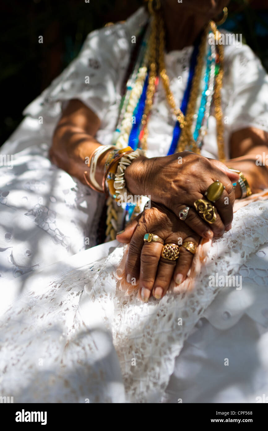 Hands of a priestess of Candomblé seen during the ritual ceremony in ...