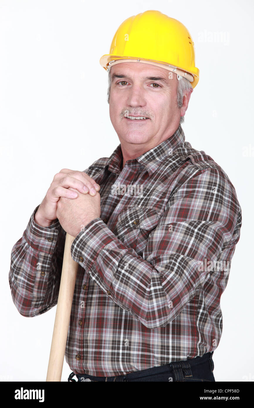 Portrait of an elderly labourer Stock Photo - Alamy