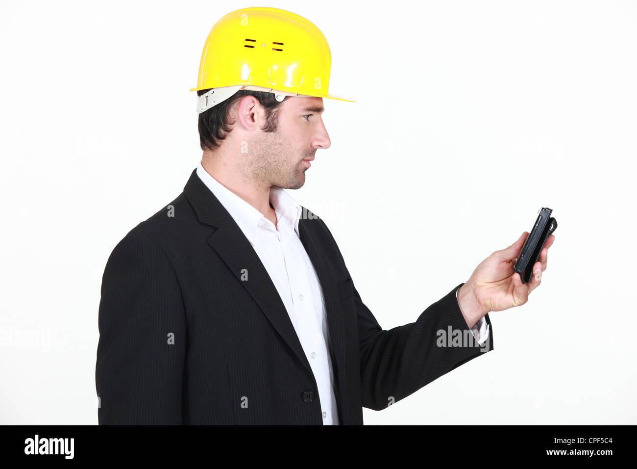 architect puzzled at sms Stock Photo - Alamy
