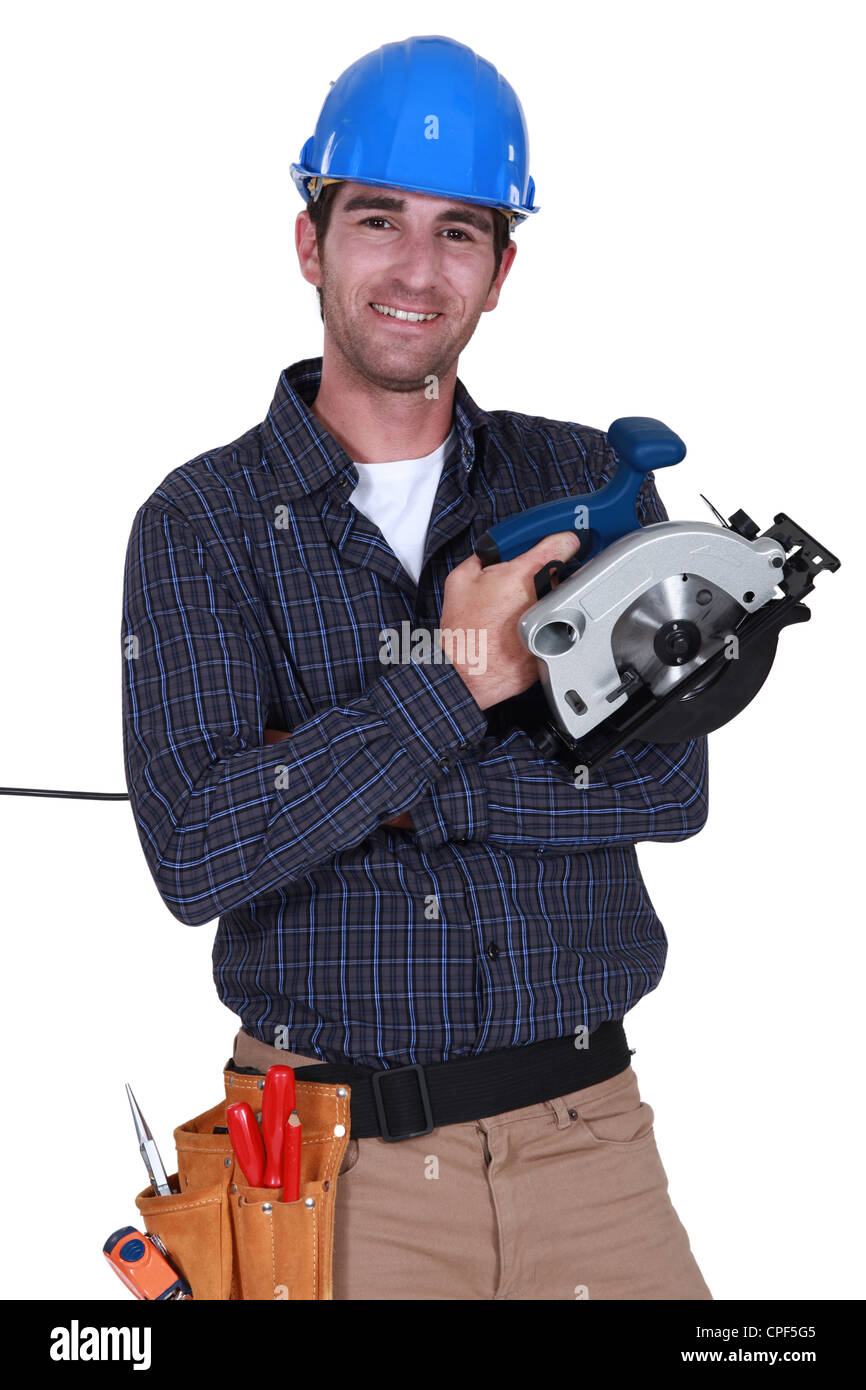 Man holding saw hammer wood hi-res stock photography and images - Alamy