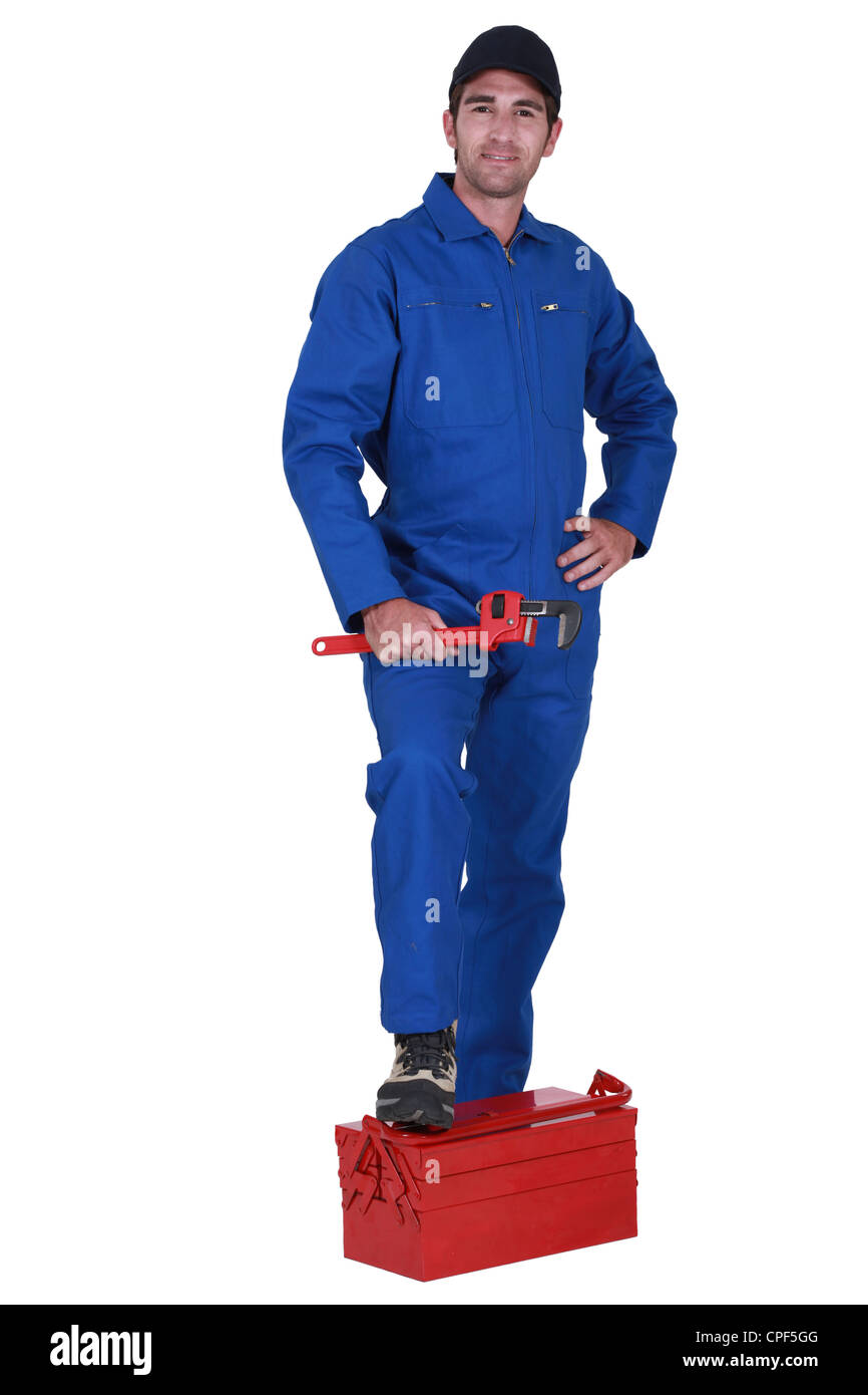 Worker with an adjustable wrench Stock Photo - Alamy