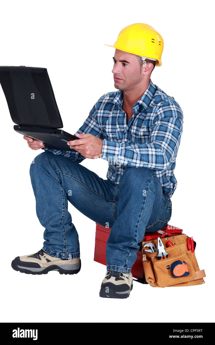 Construction worker reading news hi-res stock photography and images ...