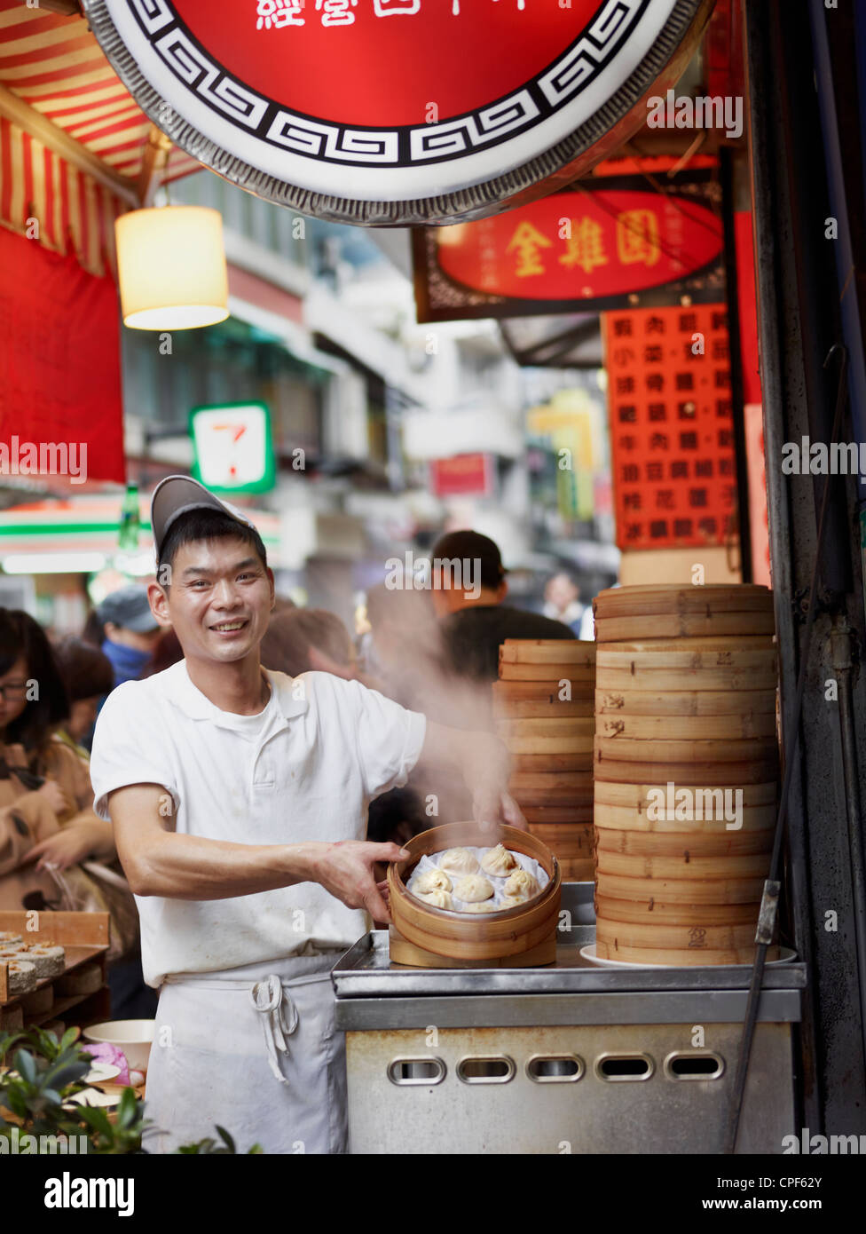 Dumplings, a traditional Chinese delicacy, being prepared by a street ...