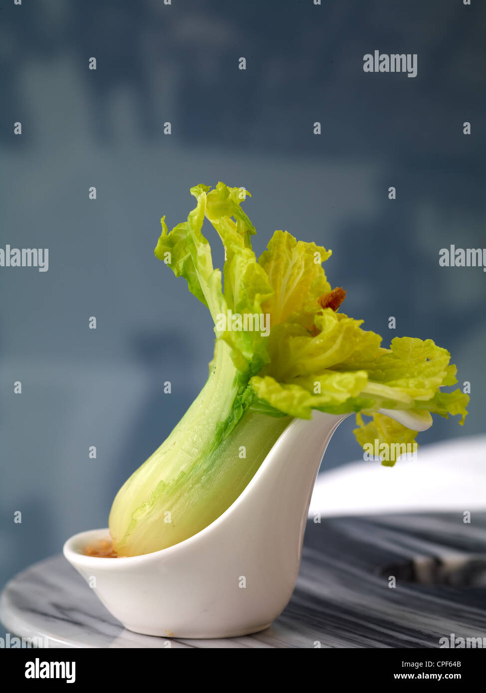 A "Jadeite Cabbage" created with Bok Choy topped with Shrimp. A ...