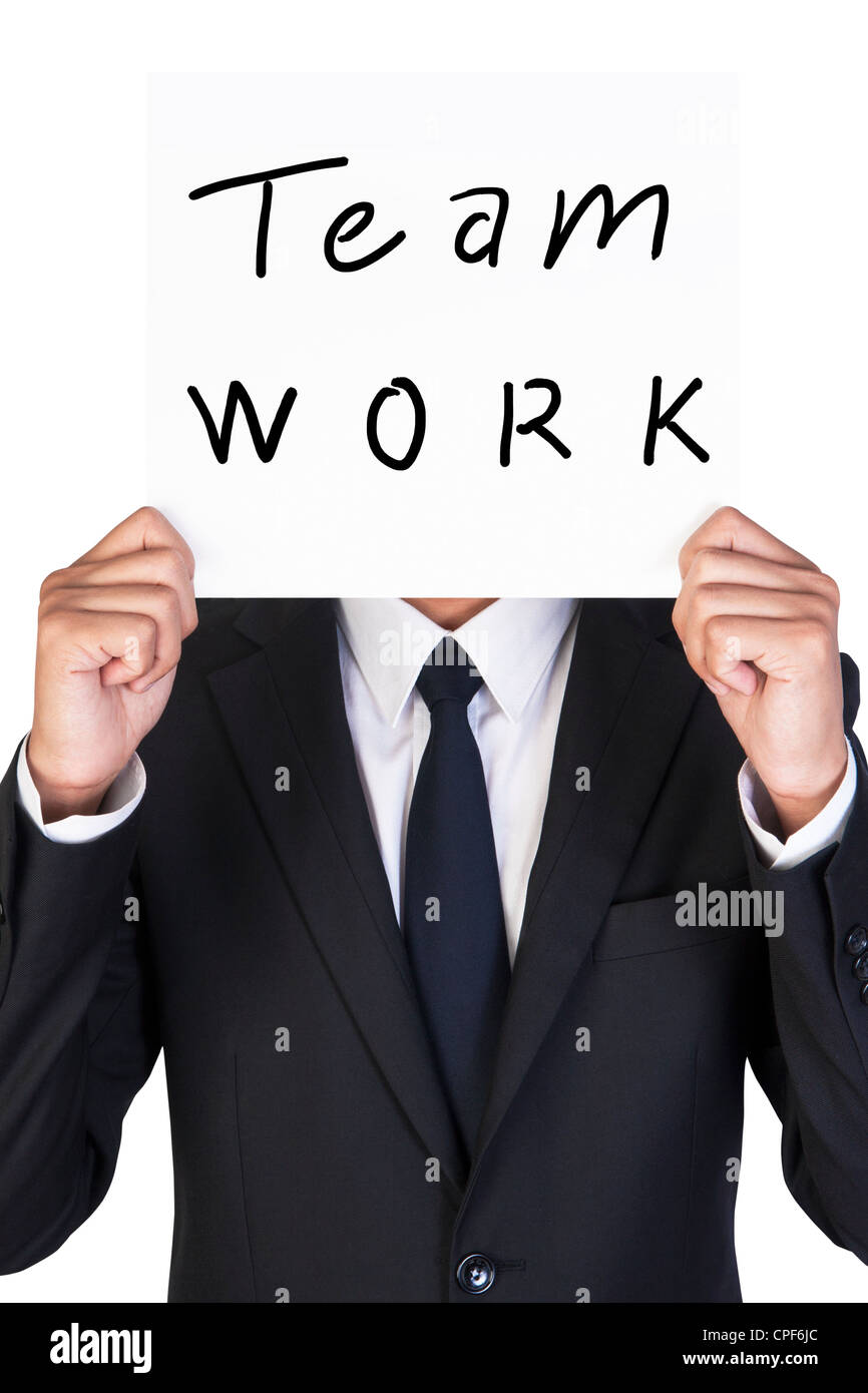 Businessman holding paper written teamwork in hand Stock Photo - Alamy