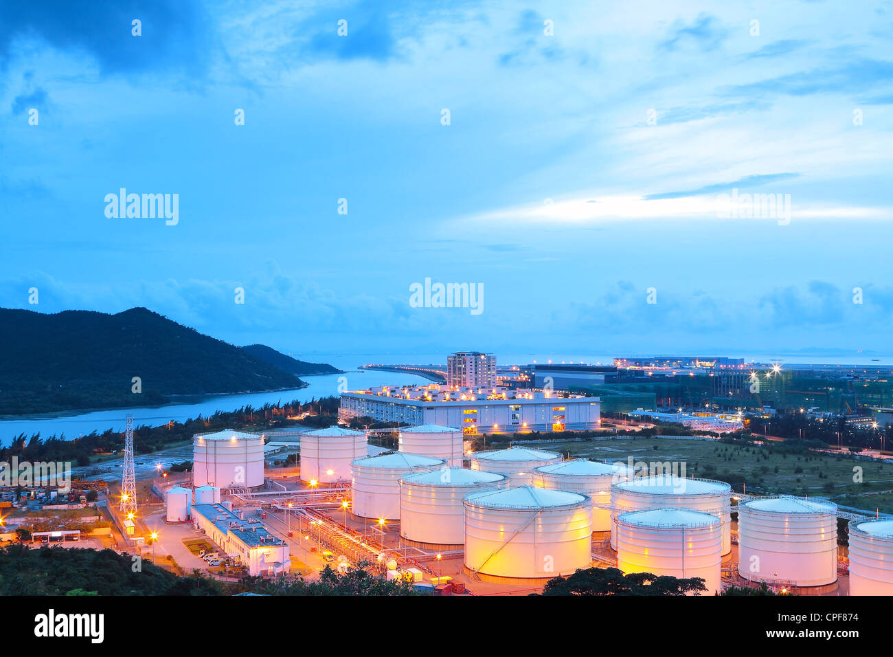 oil tank at night Stock Photo - Alamy