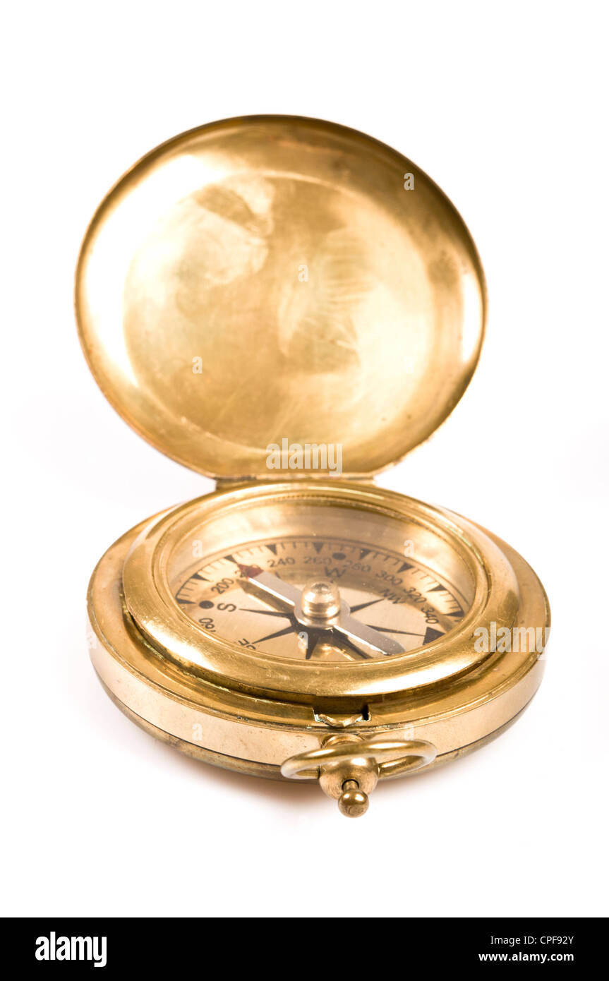 antique brass compass, isolated Stock Photo - Alamy