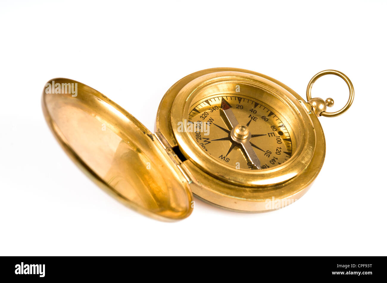 antique brass compass, isolated Stock Photo - Alamy